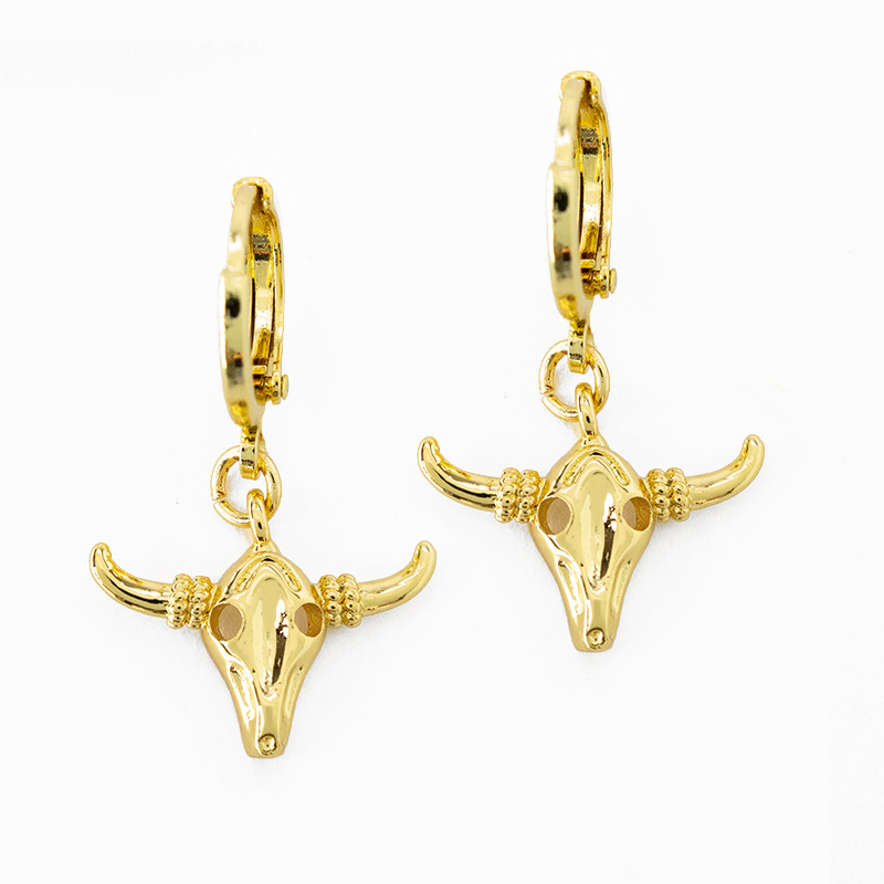 Aretes dama con colgante de craneo de Toro en Chapa de Oro