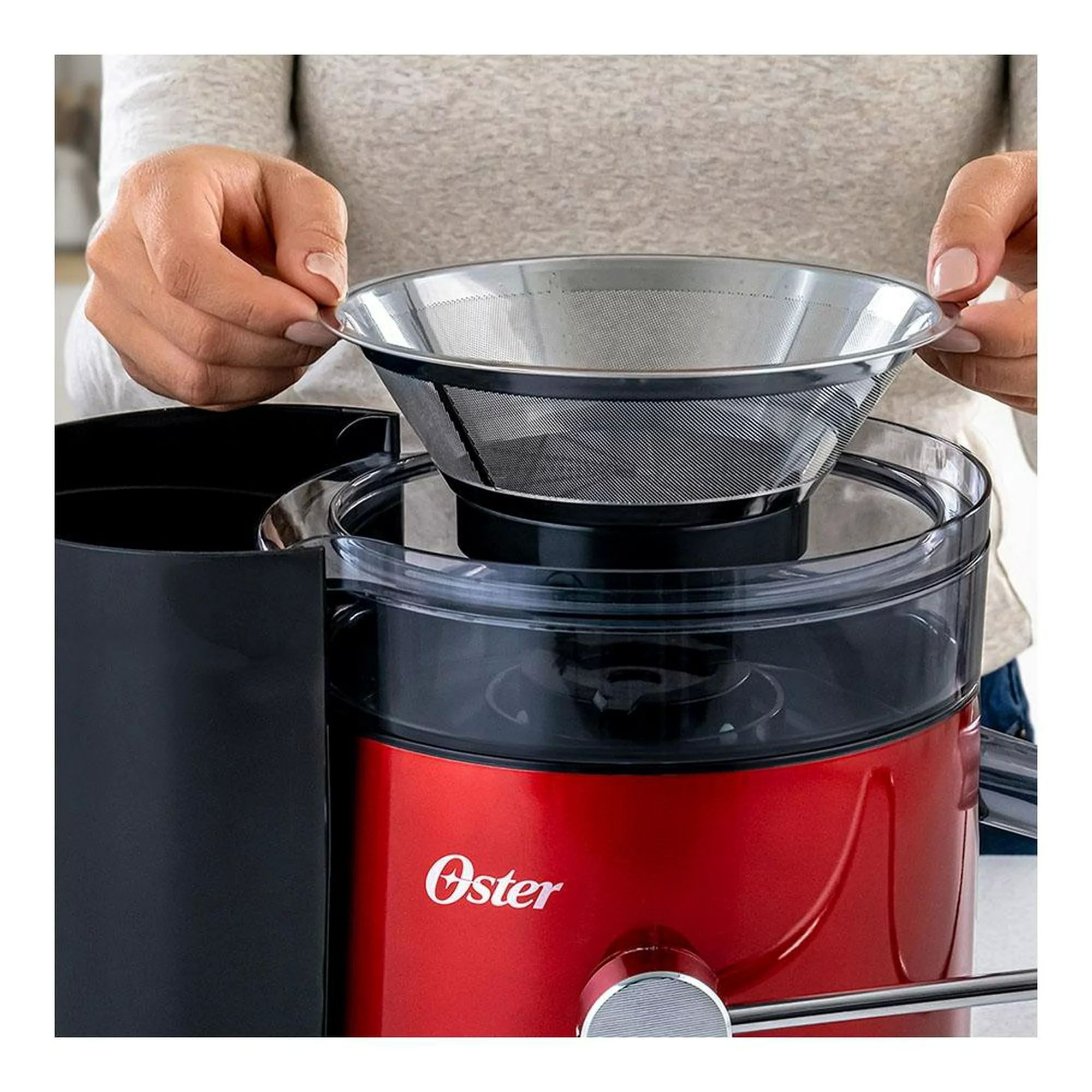 Extractor de Jugos Oster con Boca Ancha Rojo