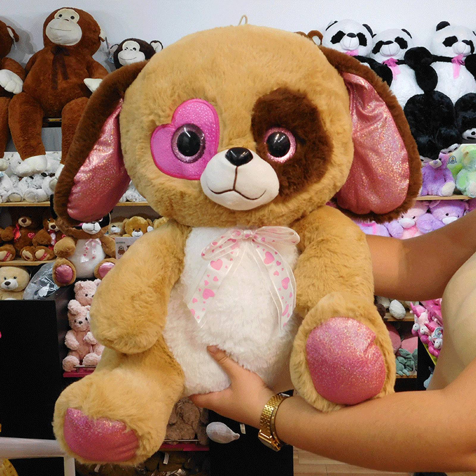 Perro de peluche con ojos brillantes 50cm PELUCHERIA